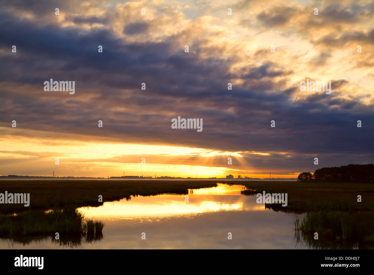 sunbeams through cloud Stock Photo - Alamy