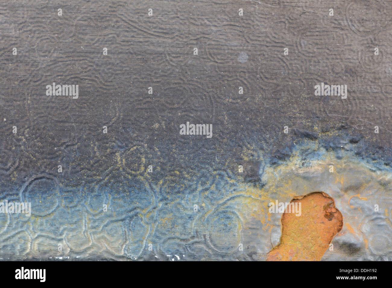 metal with blue and orange rust Stock Photo - Alamy