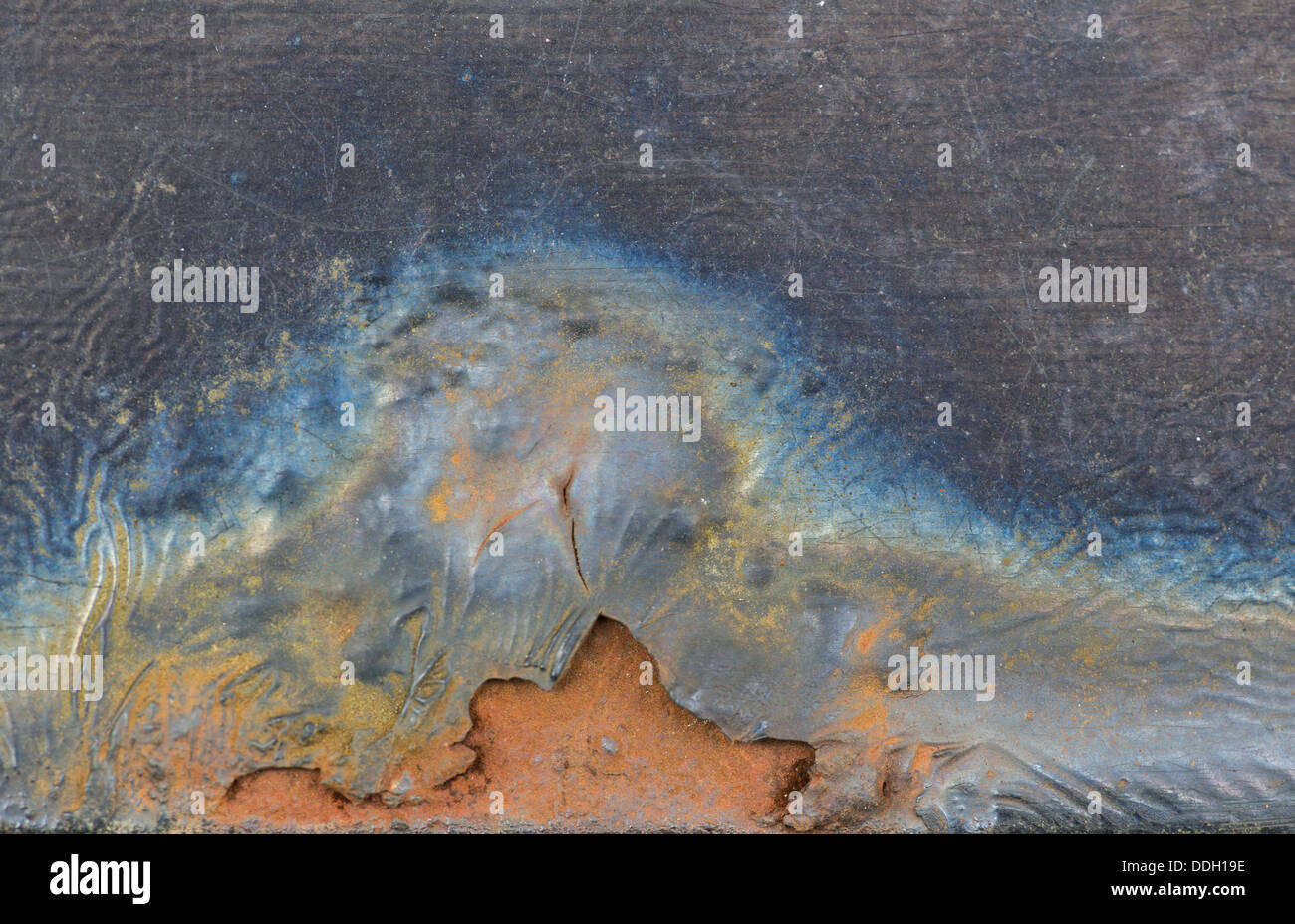 metal with blue and orange rust Stock Photo - Alamy