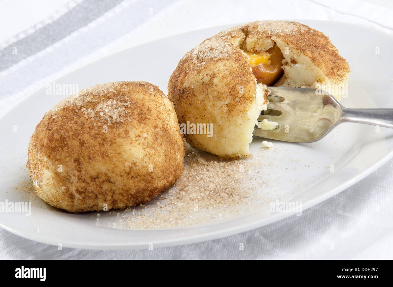 fruit dumpling with cinnamon and sugar Stock Photo - Alamy