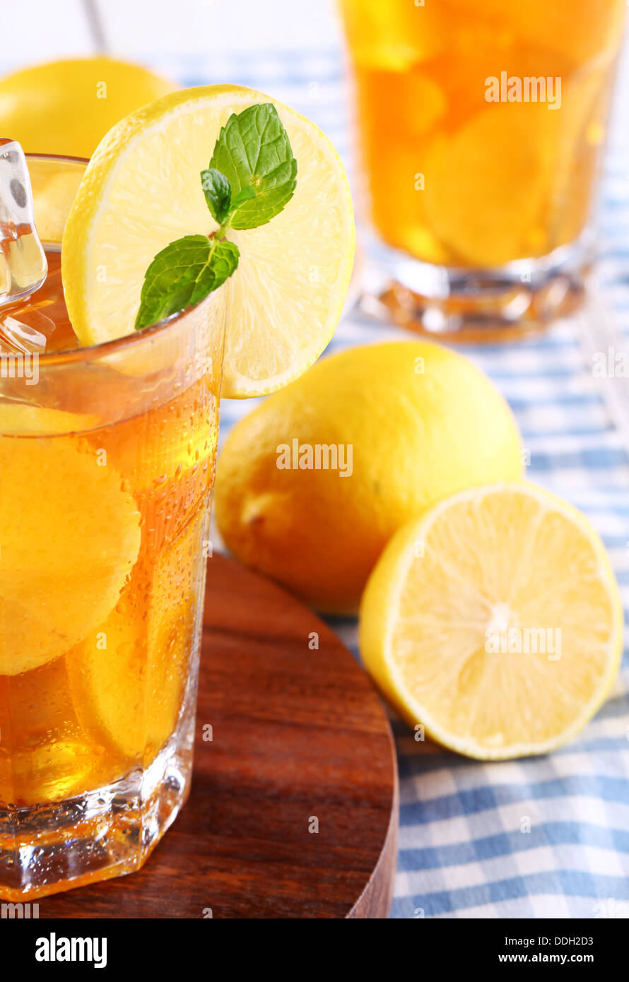 Fresh and cold ice tea with sliced lemon and mint Stock Photo - Alamy