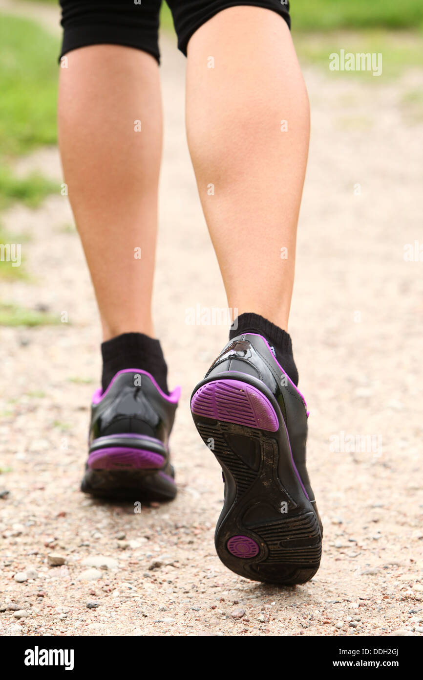 Close up of walking legs on the road Stock Photo - Alamy