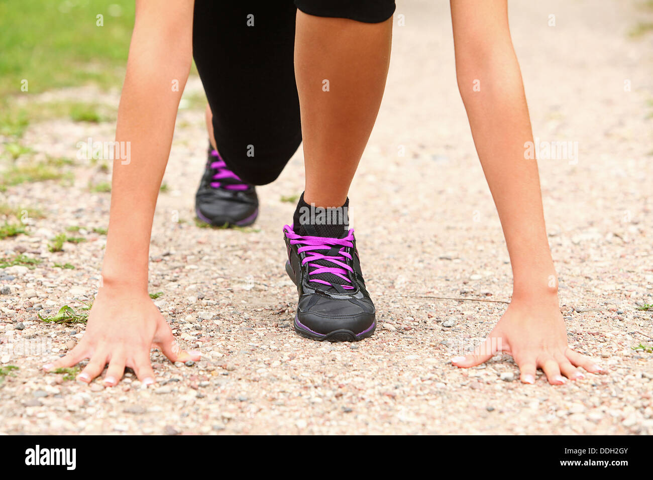 Sporty woman ready for run close up Stock Photo - Alamy