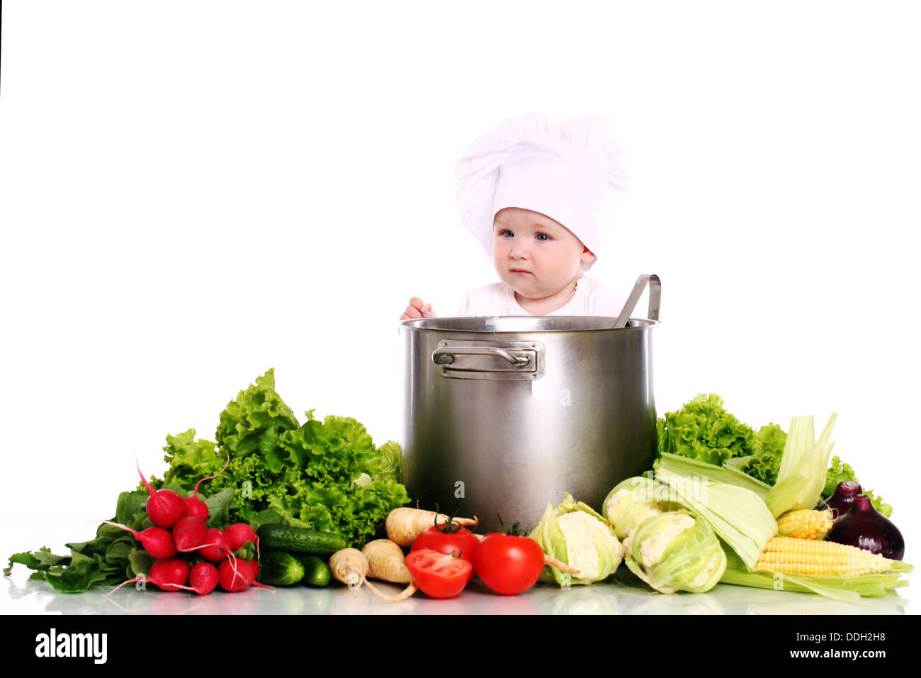 Baby cook with pan and vegetables on a white Stock Photo - Alamy