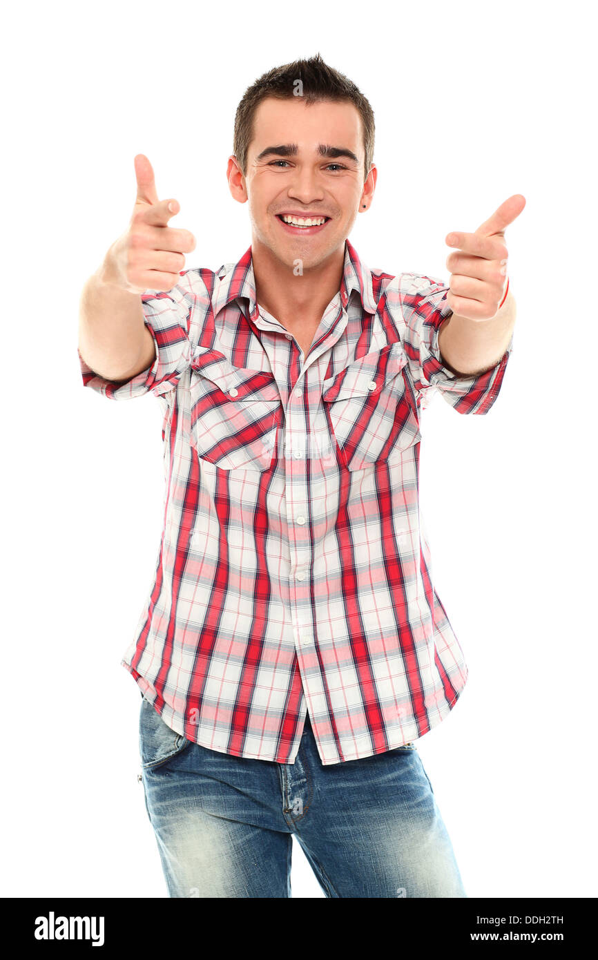 Handsome and young positive man showing on you Stock Photo - Alamy