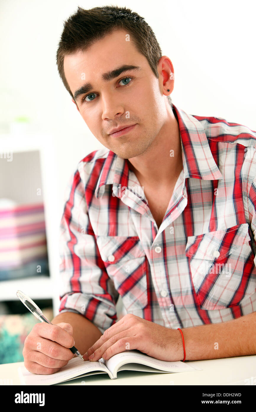 Young and smart student do his homework Stock Photo - Alamy
