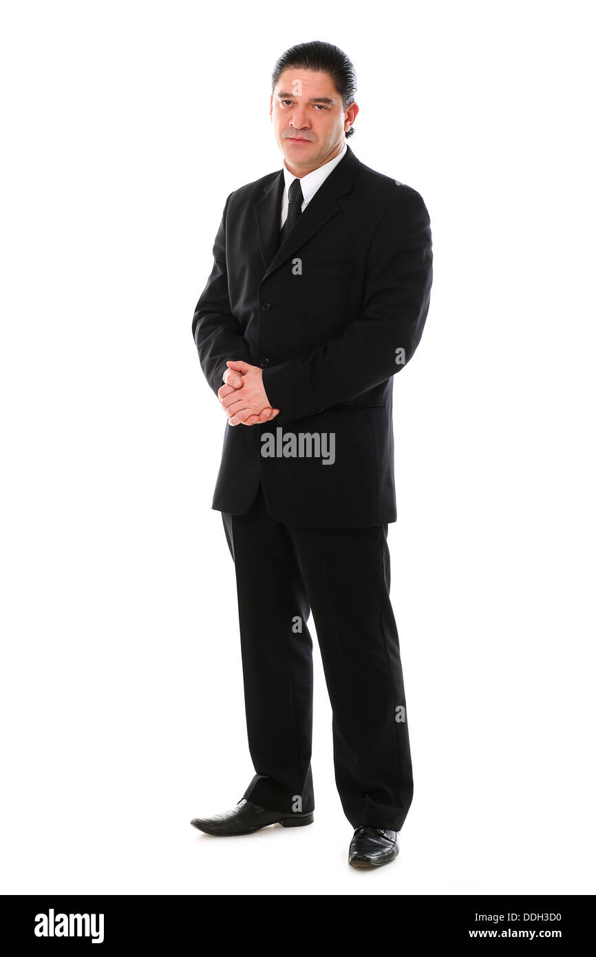 Confident mid aged man in suit posing in studio Stock Photo - Alamy