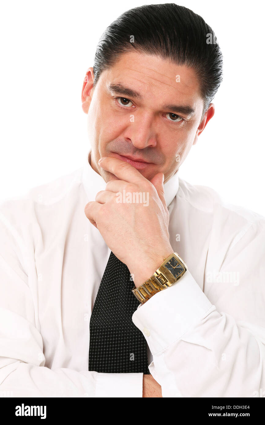 Serious mid aged businessman thinking Stock Photo - Alamy