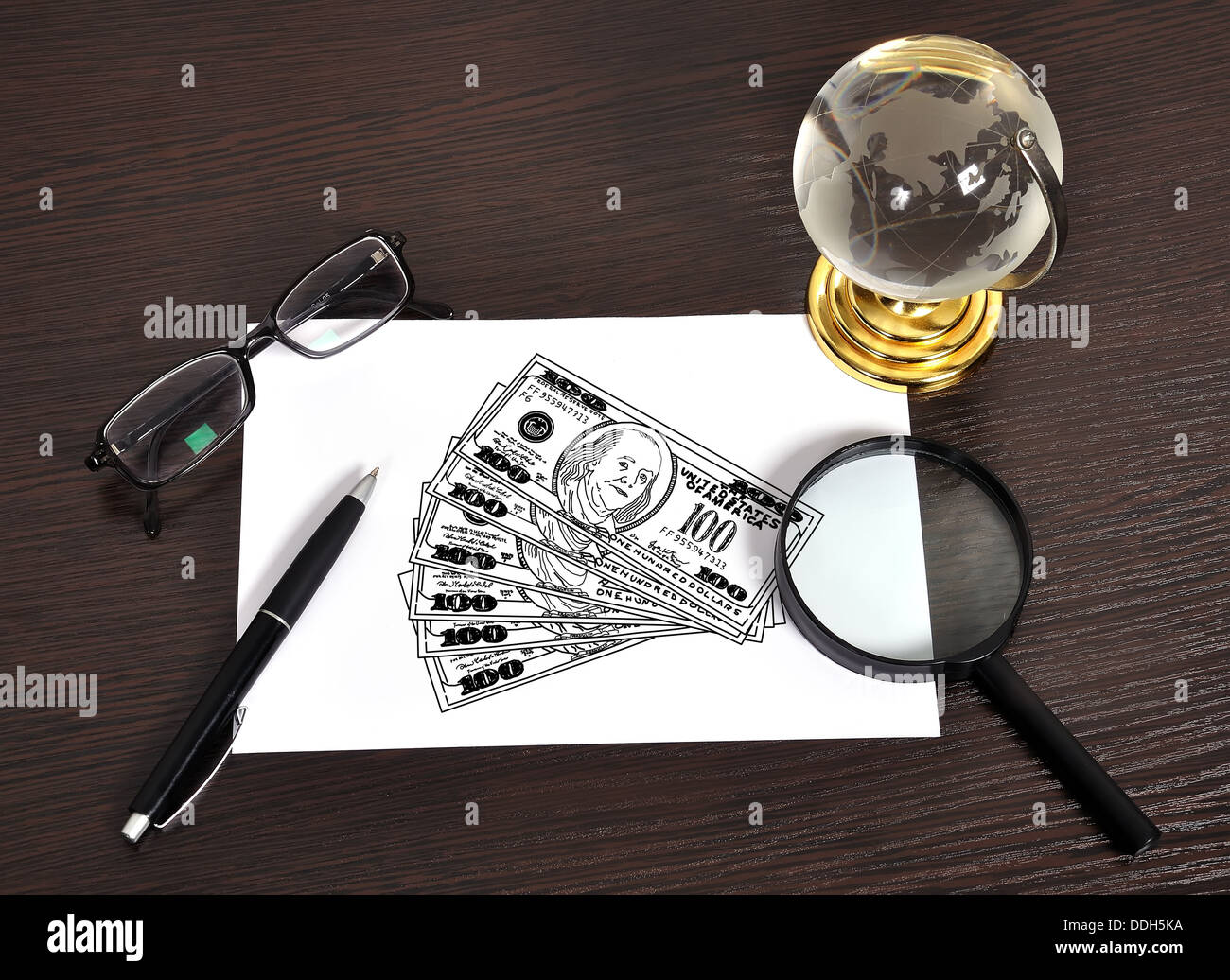 drawing dollars on paper Stock Photo - Alamy