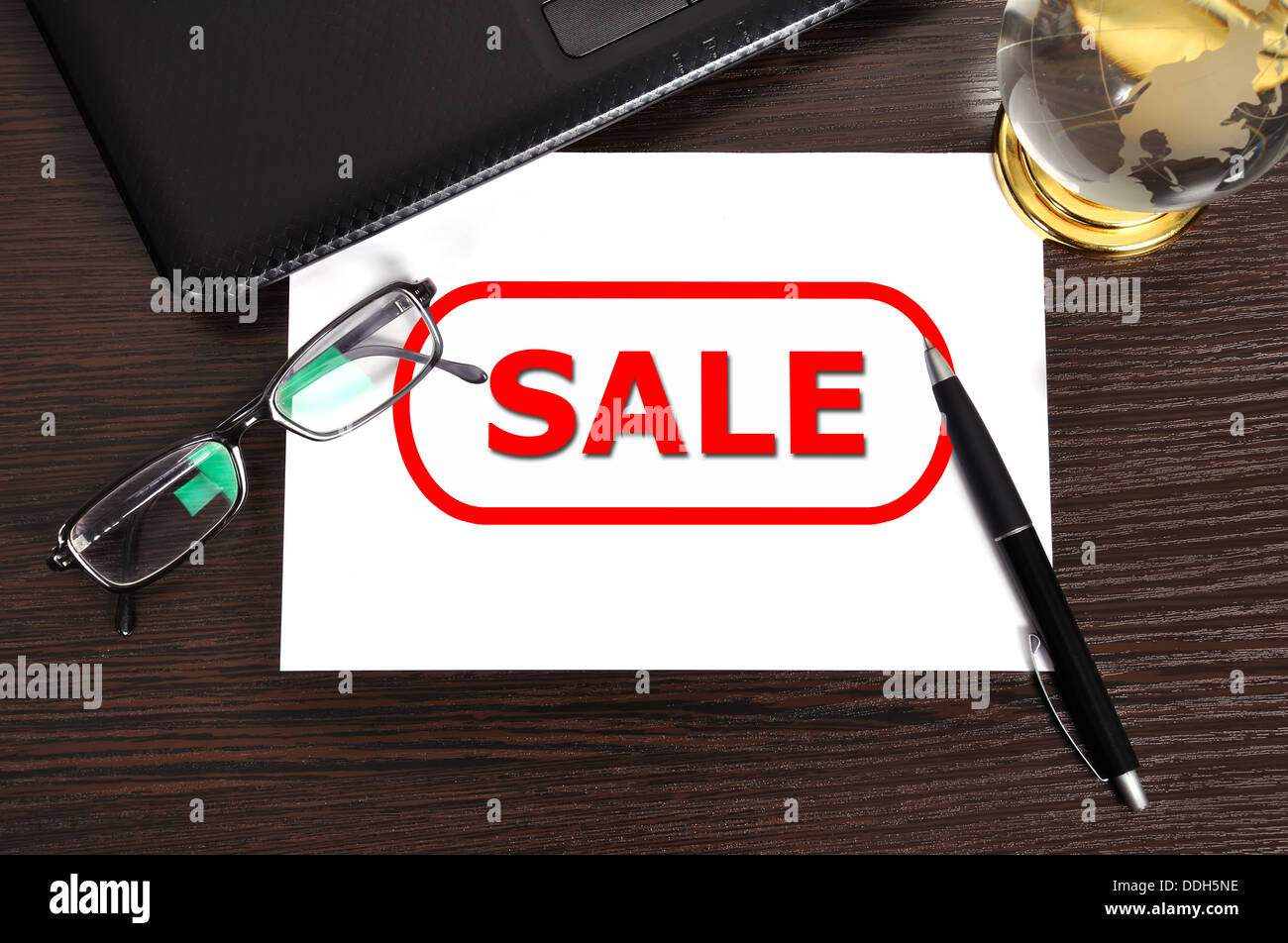 sale symbol on paper Stock Photo - Alamy