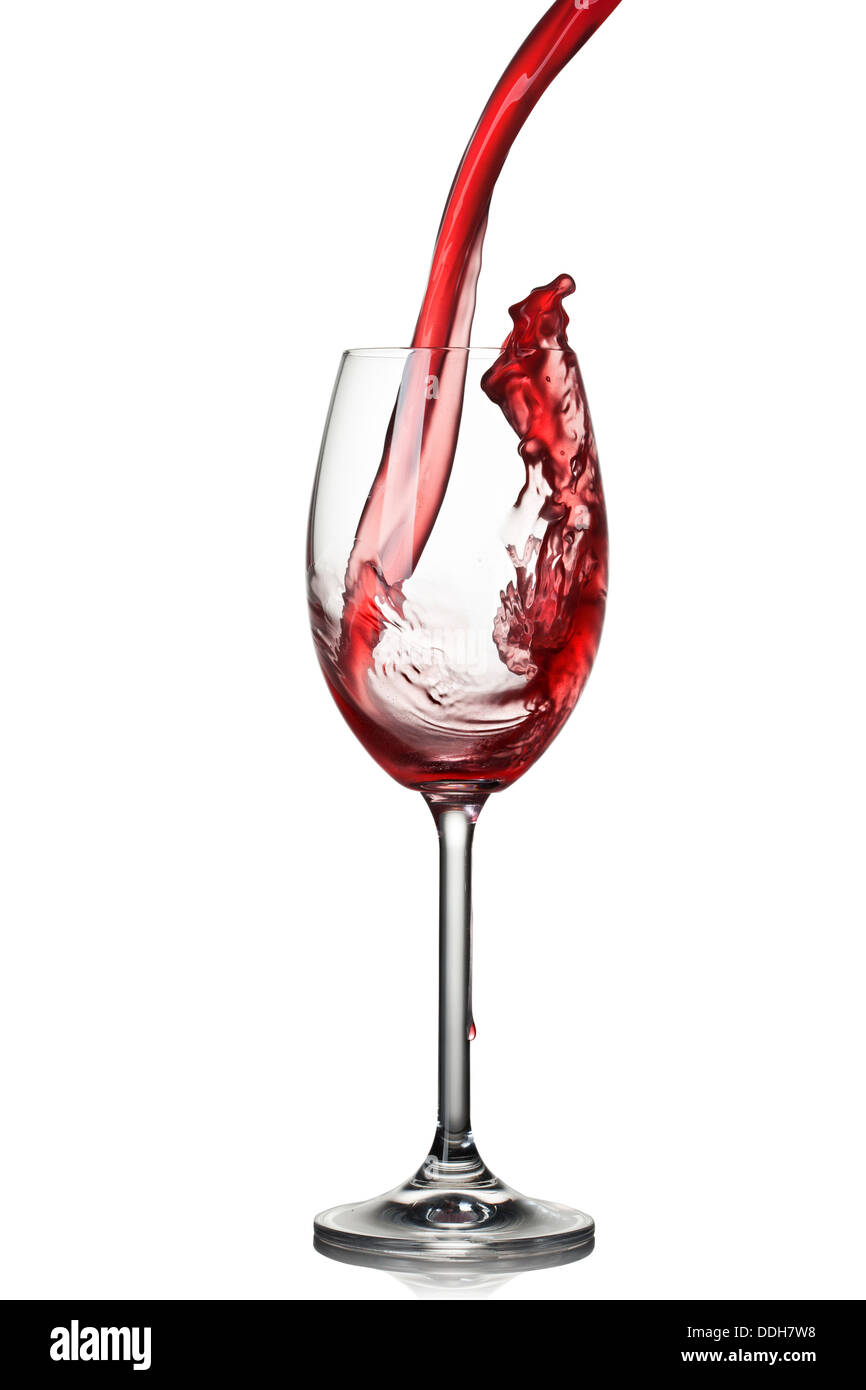 Splash of wine in glass isolated on white Stock Photo - Alamy