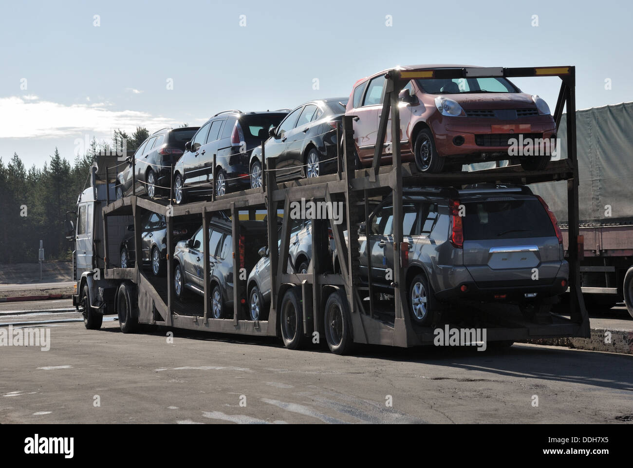 transportation of new cars on the truck Stock Photo - Alamy