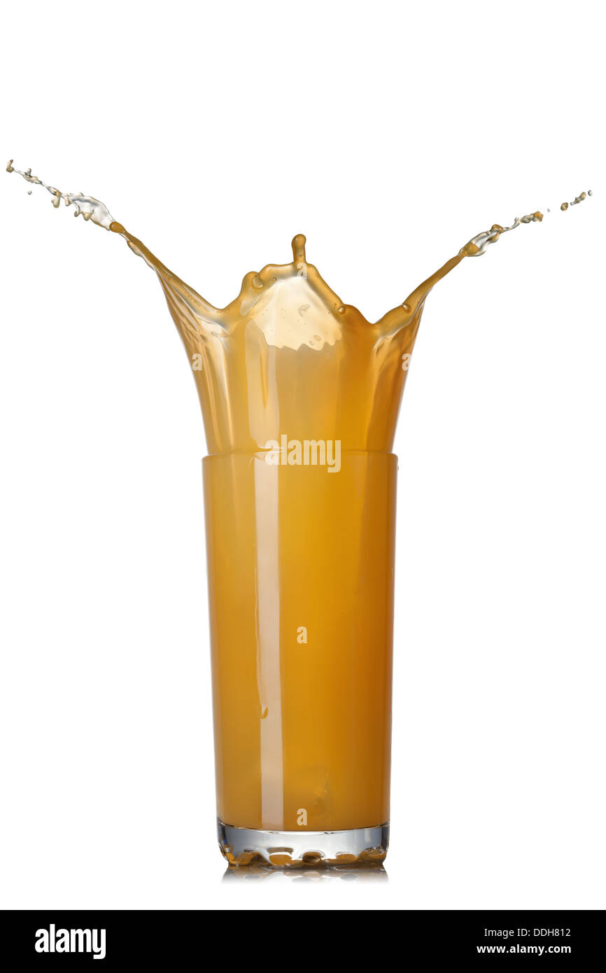 Splash of orange juice in glass isolated on white Stock Photo - Alamy