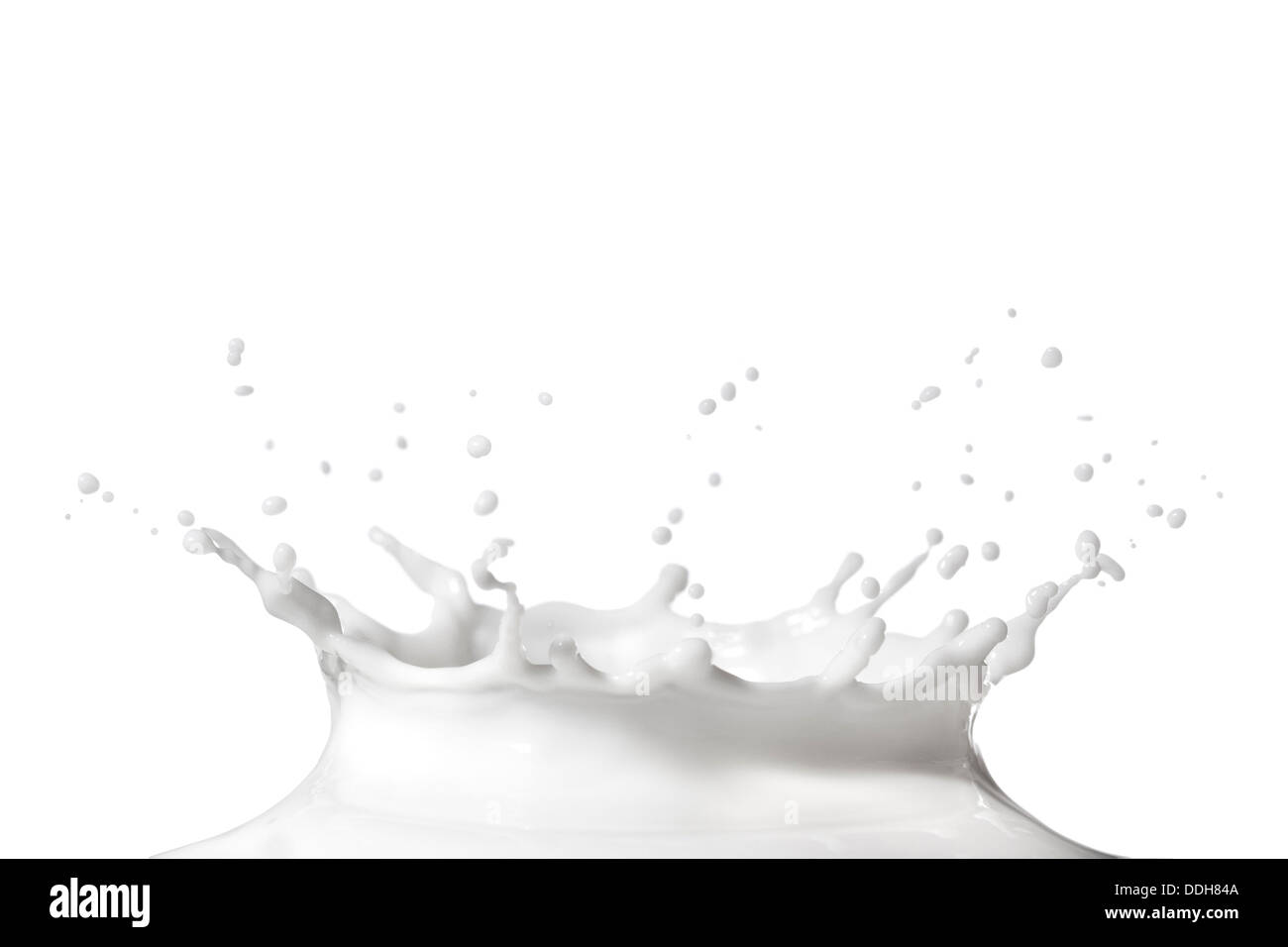 Milk splash isolated on white Stock Photo - Alamy