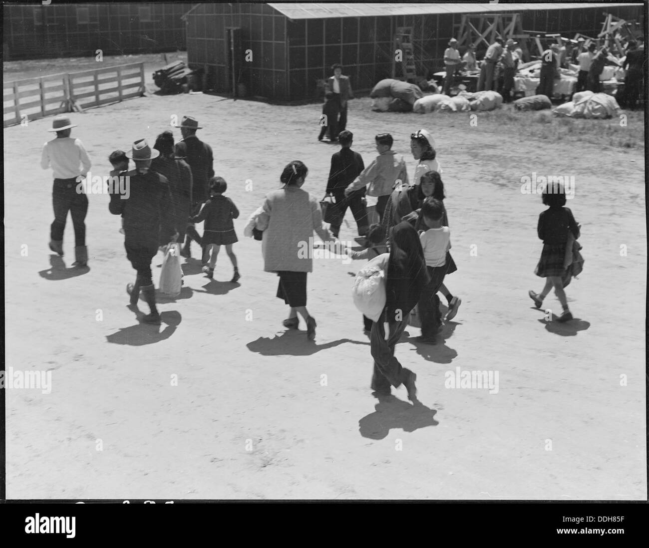 Families of Japanese ancestry arrive at the Turlock Assembly Center ...