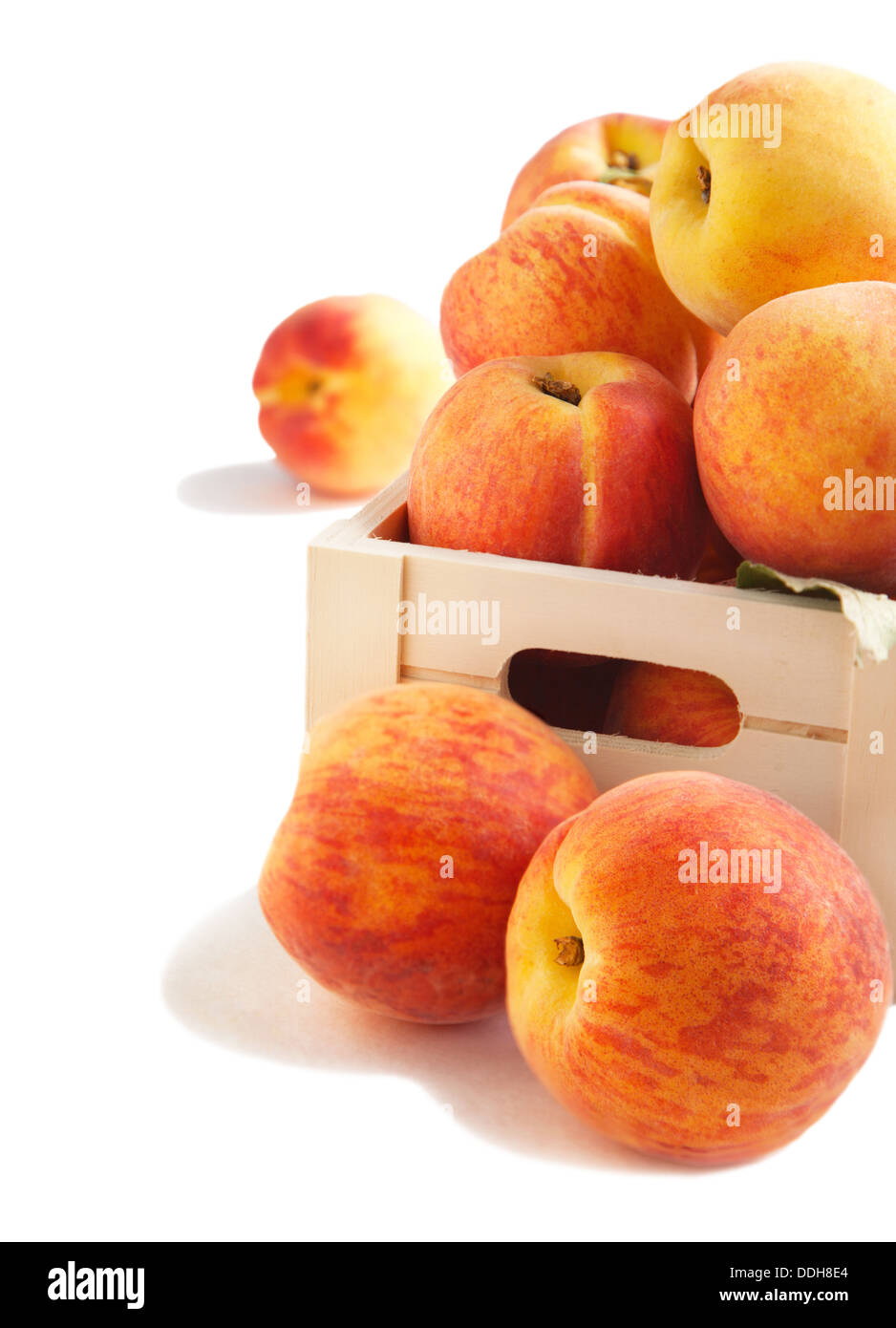 Fresh peaches in wooden box isolated on white background Stock Photo ...
