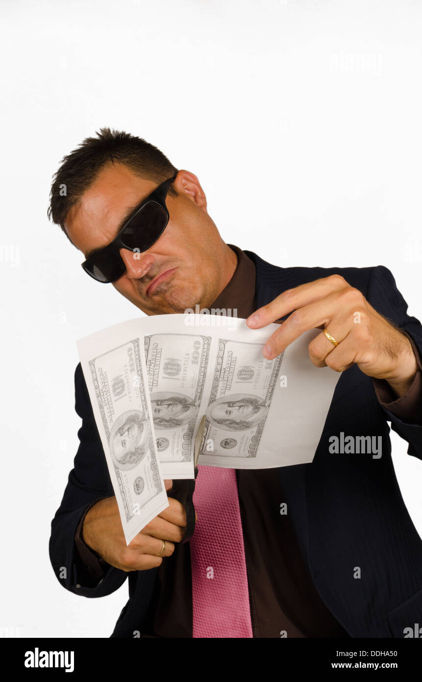 Mafia looking type of guy forging dollar bills Stock Photo - Alamy