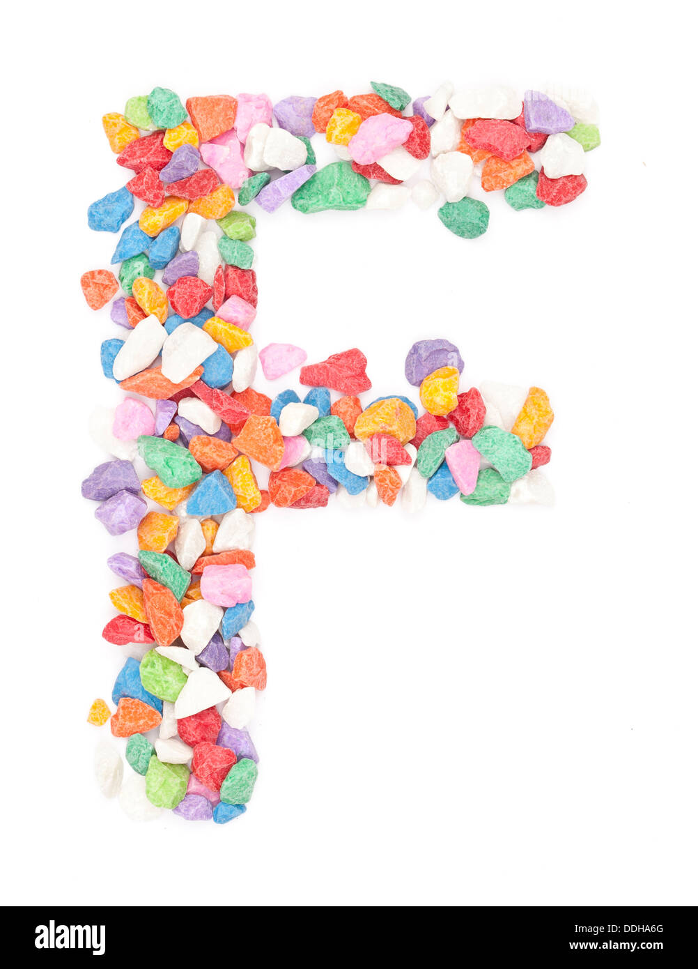 F alphabet colorful gravel on white background Stock Photo - Alamy