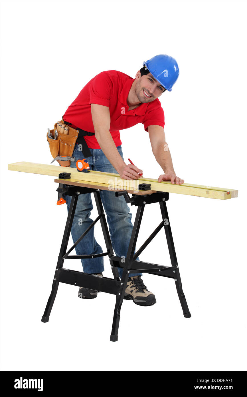 Man marking a measurement Stock Photo - Alamy