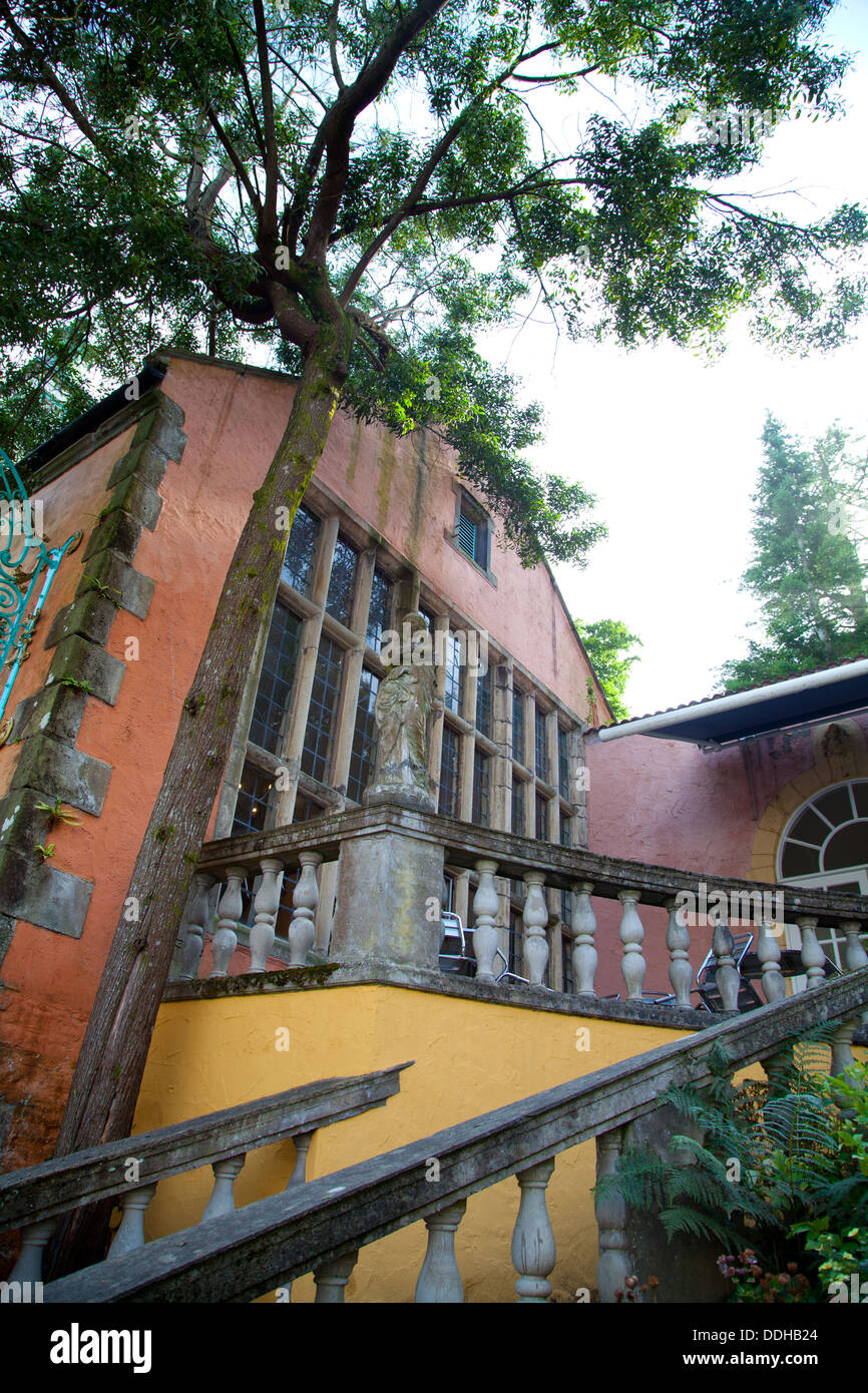 View of Hercules Hall in Portmeirion Village with trees & blue sky ...