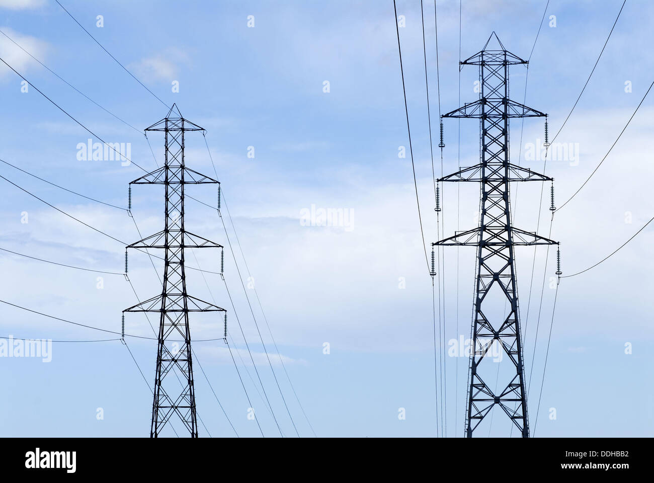 Pair of electricity pylons hi-res stock photography and images - Alamy
