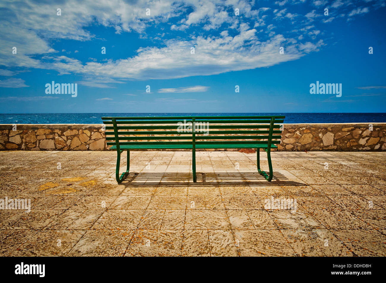 Italy, View of empty bench at beach Stock Photo - Alamy