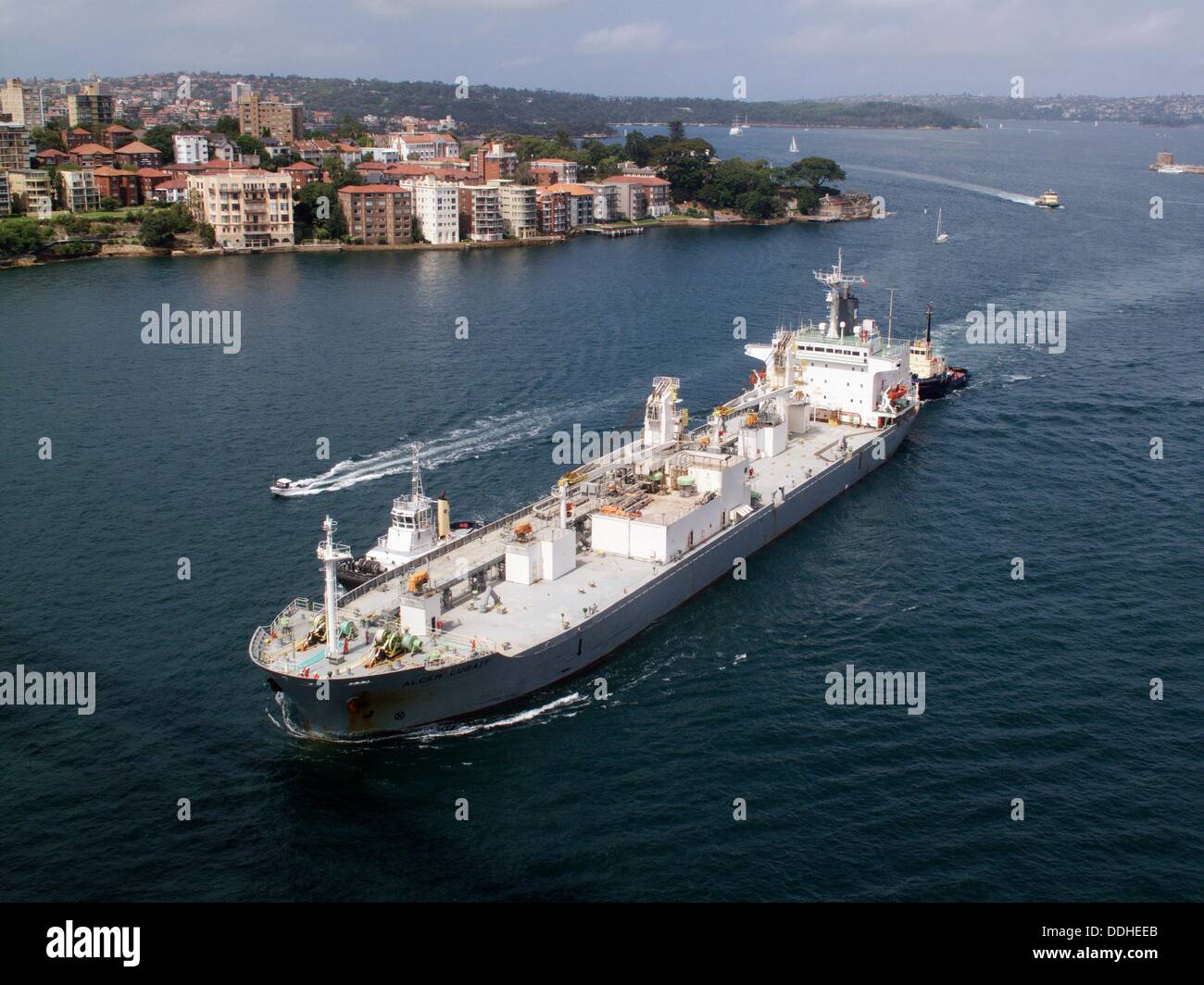 A merchant navy vessel sails through Sydney Harbour in Australia Stock ...