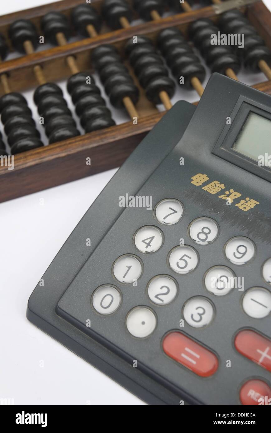 With the computer The abacus Stock Photo - Alamy