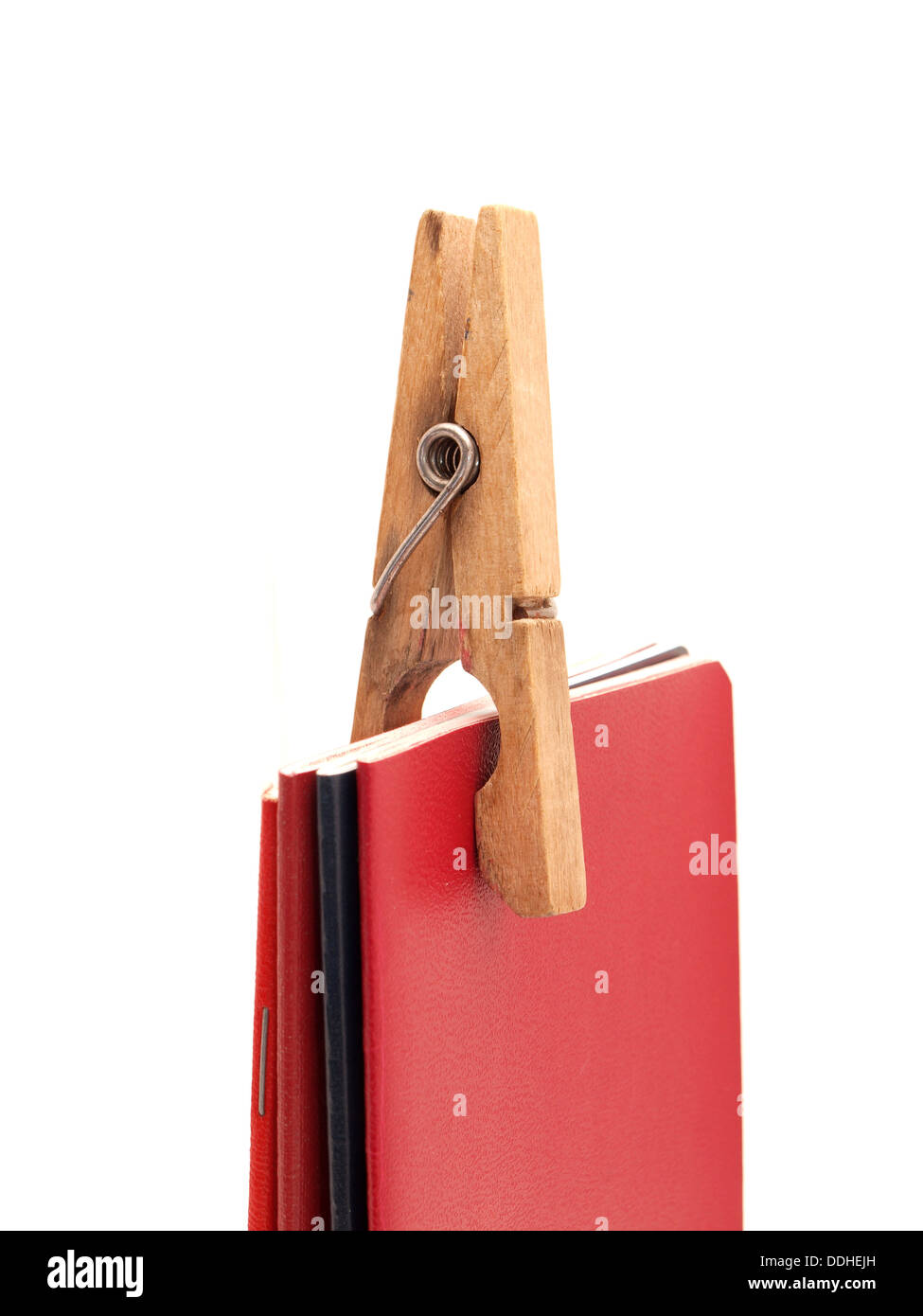 Documents and clothespin on a white background Stock Photo - Alamy