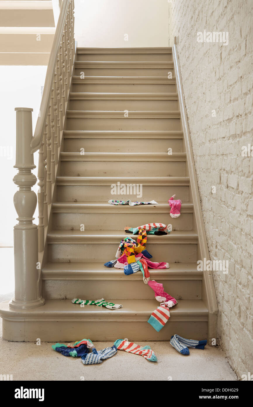 Socks fallen on staircase Stock Photo - Alamy