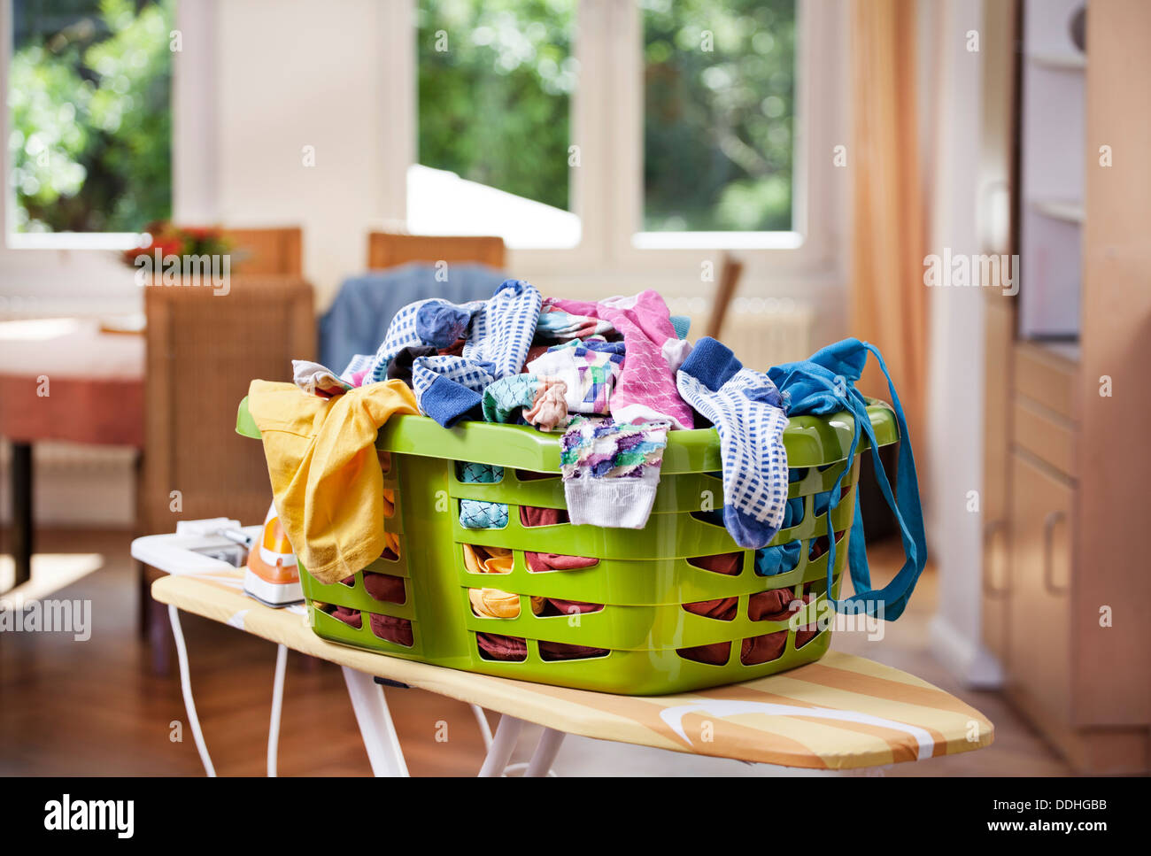 Germany, North Rhine Westphalia, Cologne, Clothes in laundry basket ...
