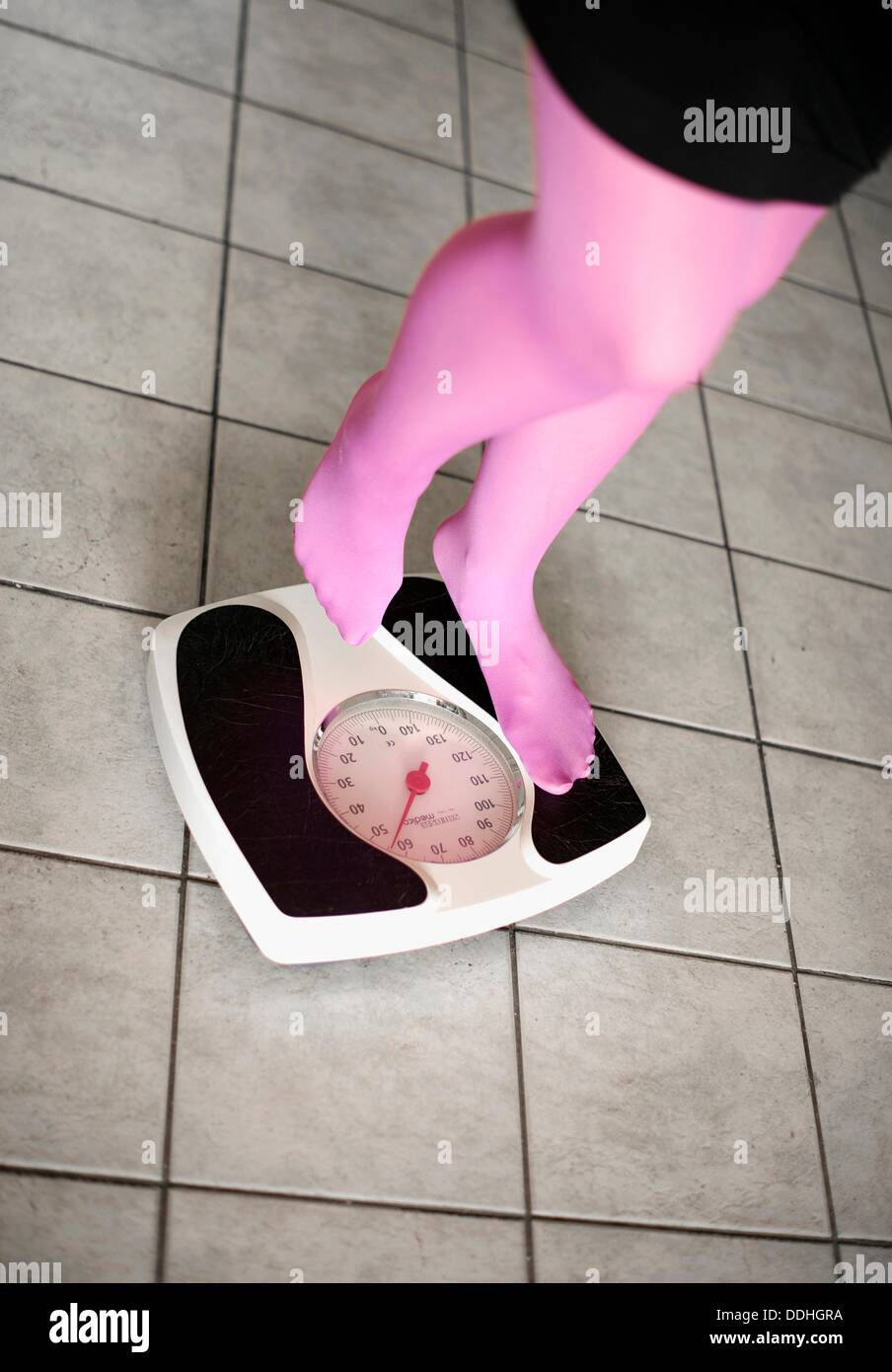 One leg woman on scales hi-res stock photography and images - Alamy