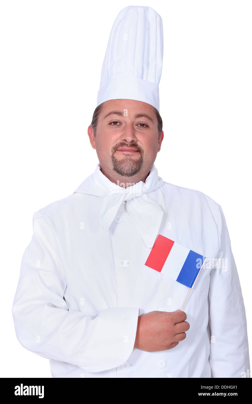 Kitchen chef holding French flag Stock Photo - Alamy