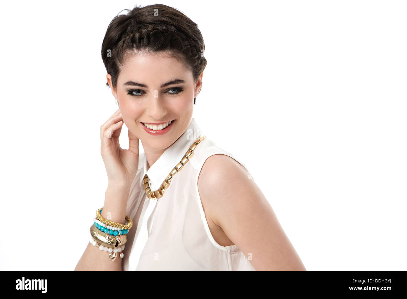 Young woman looking down, smiling Stock Photo - Alamy