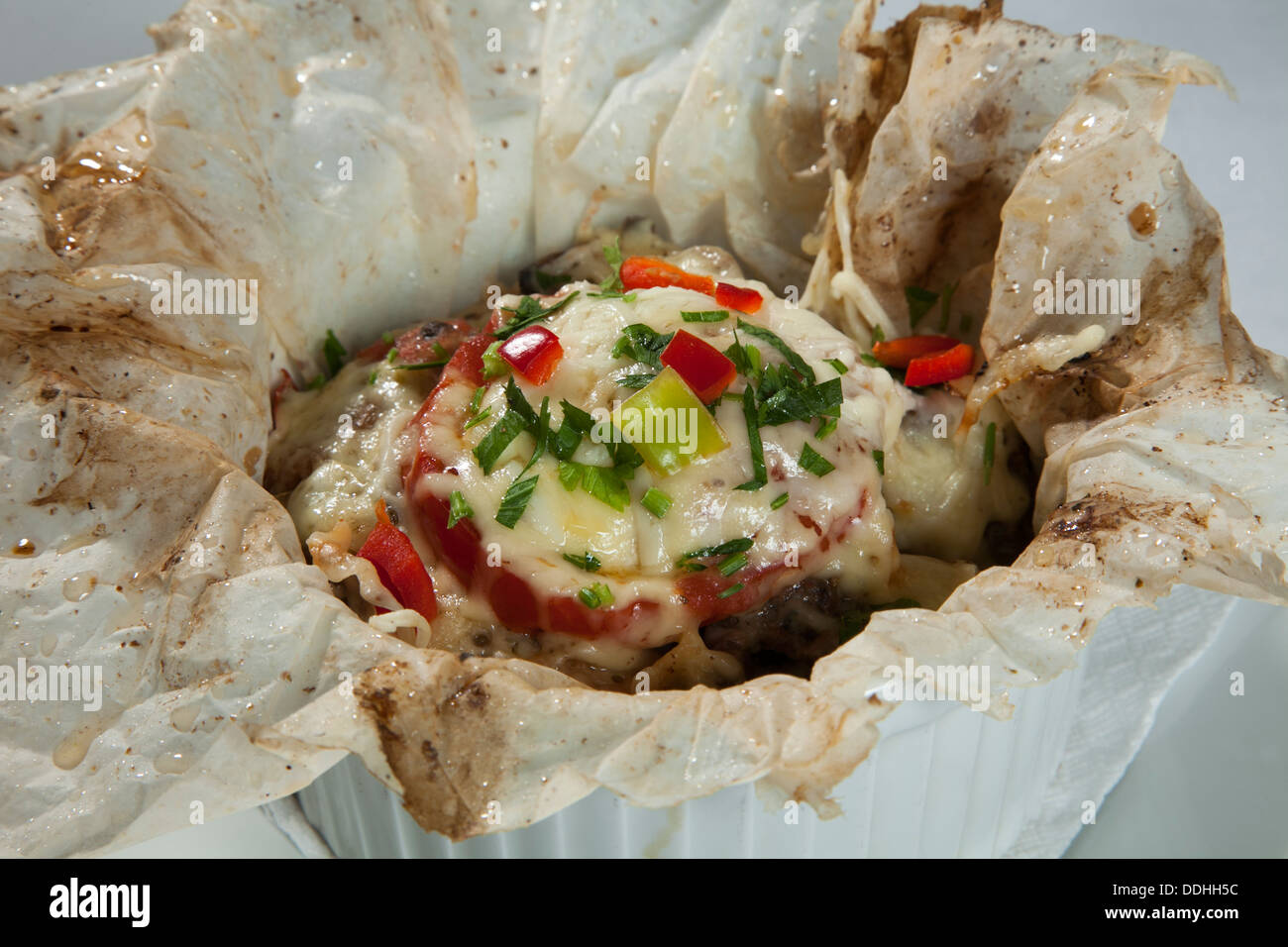 Beef meat cooked in clay pot in oven served in same pot with melted ...