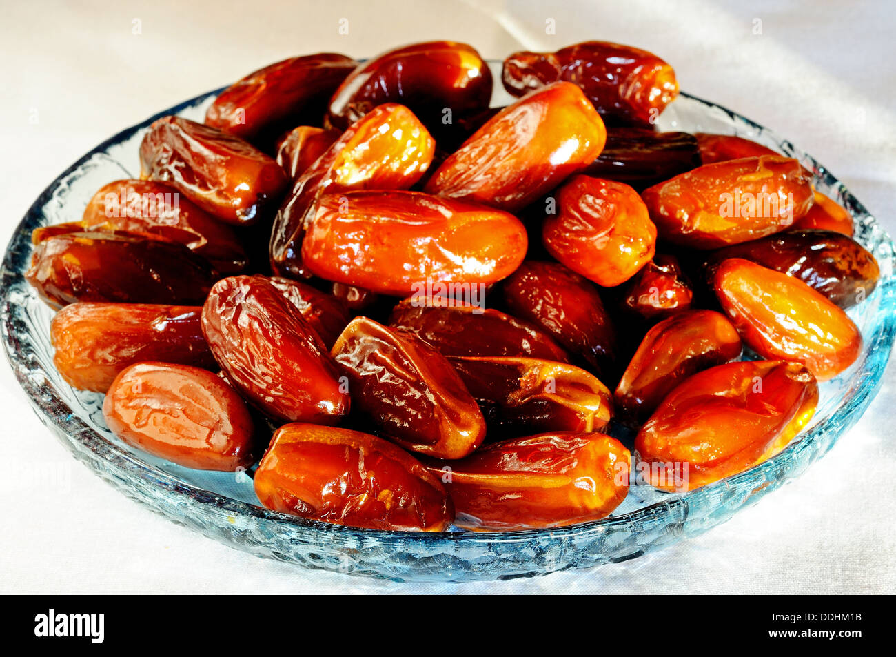 Dates in a shallow glass dish, England, UK, Western Europe Stock Photo ...
