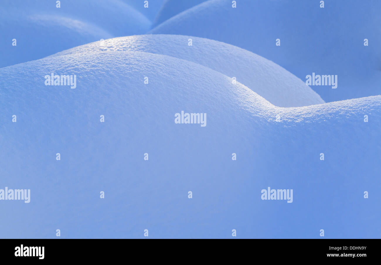 Curved shapes in the snow Stock Photo - Alamy