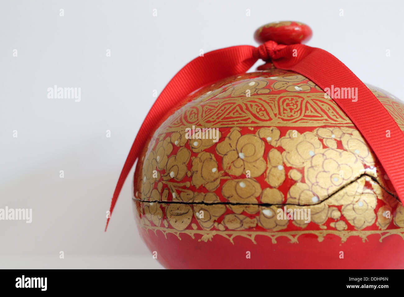 Ornate Turkish gift box with red ribbon Stock Photo - Alamy