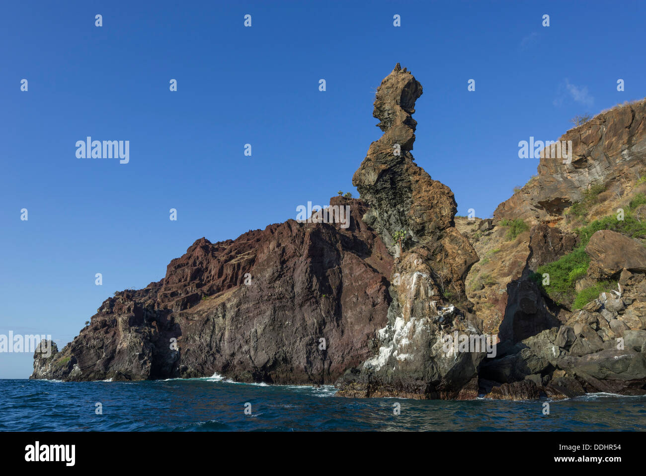 Praying Monk rock formation at the lava coast Stock Photo - Alamy
