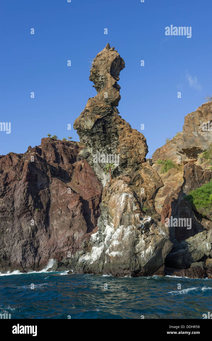 Praying Monk rock formation at the lava coast Stock Photo - Alamy