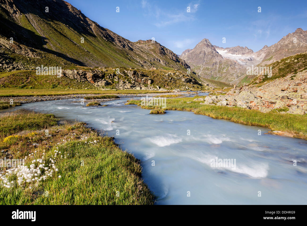 Glacial stream flowing towards Jamtal Valley, raised mire of Breites ...