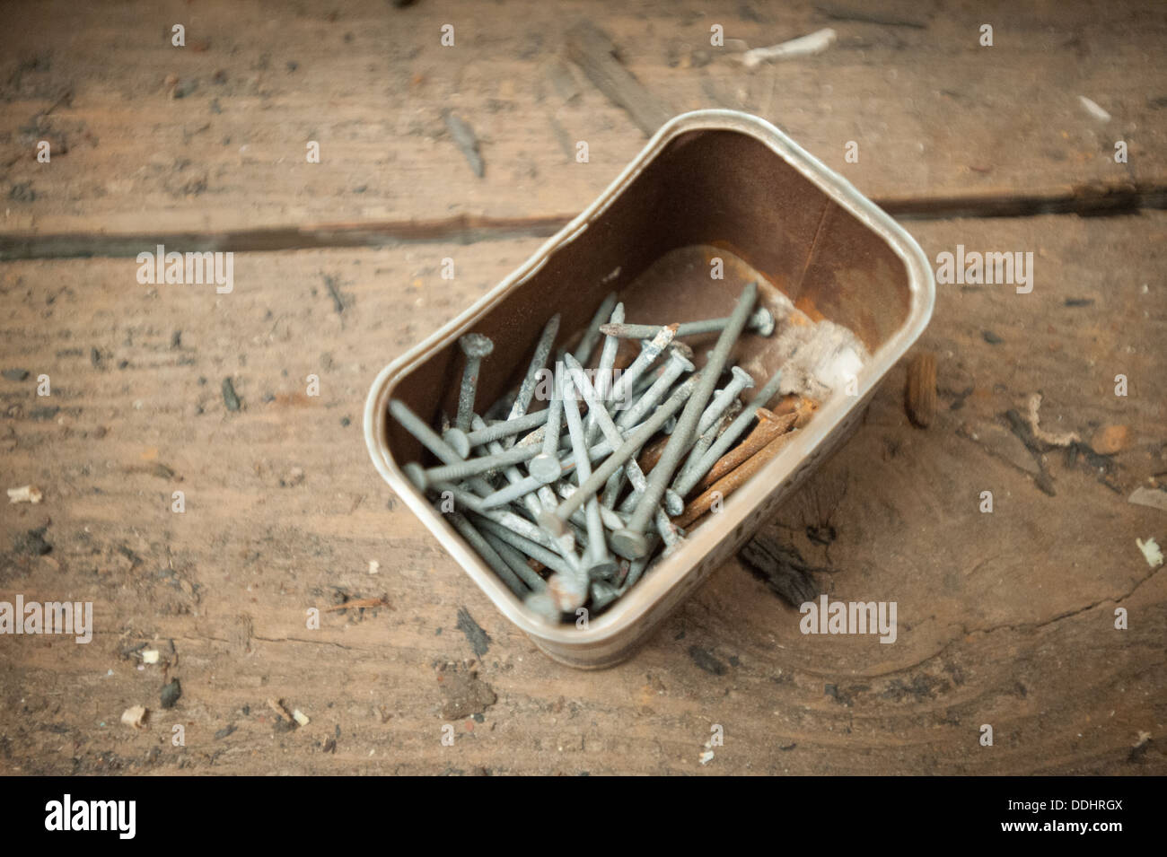 Box of nails and rusty nails at wood shop for ship restoration Stock ...