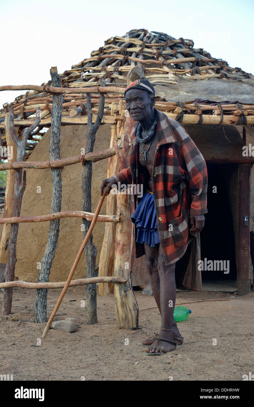 Chief Hikuminue Kapika, chief of the Namibian Himba in front of his hut ...