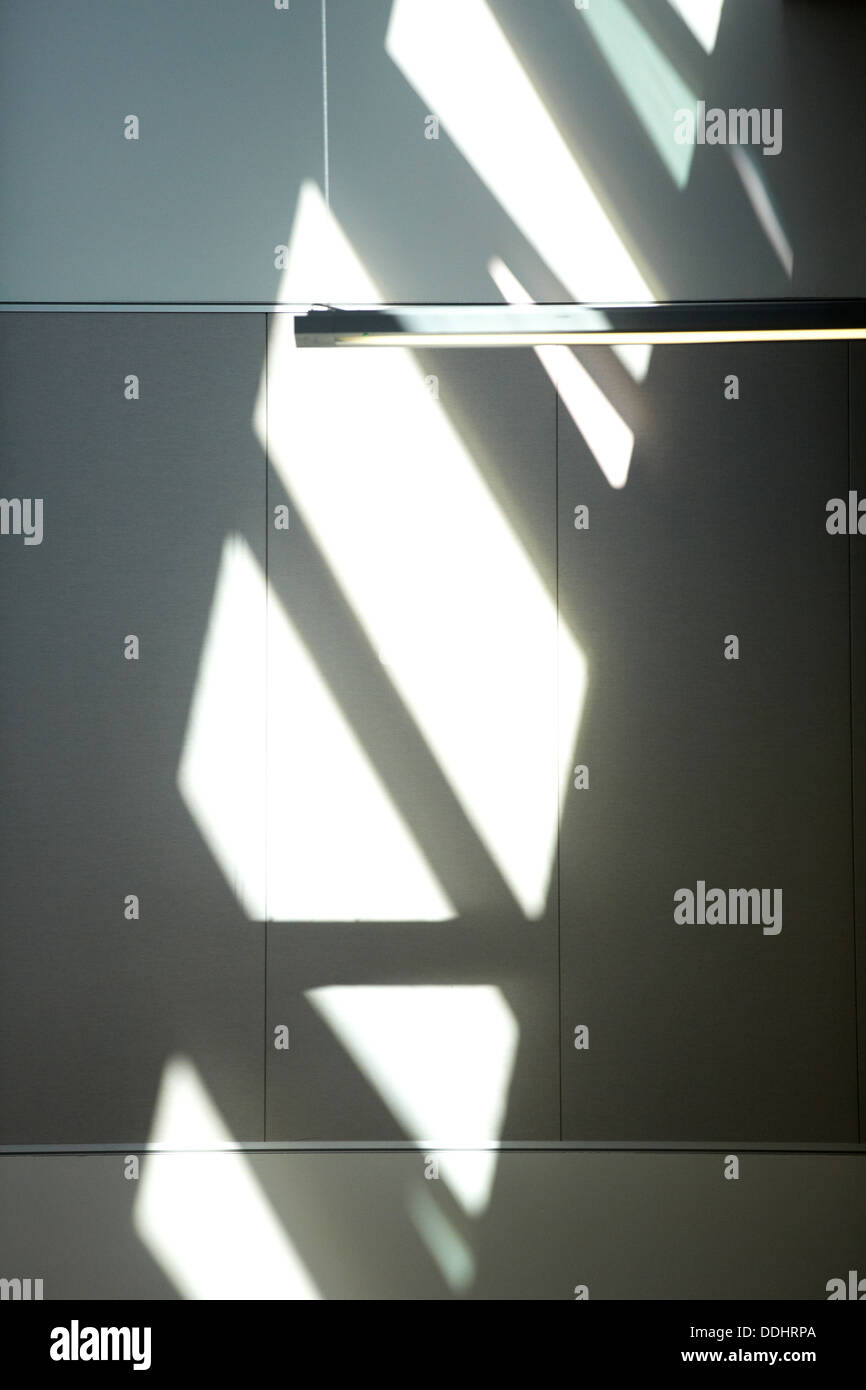 Abstract shadows cast by the window light on a wall Stock Photo - Alamy