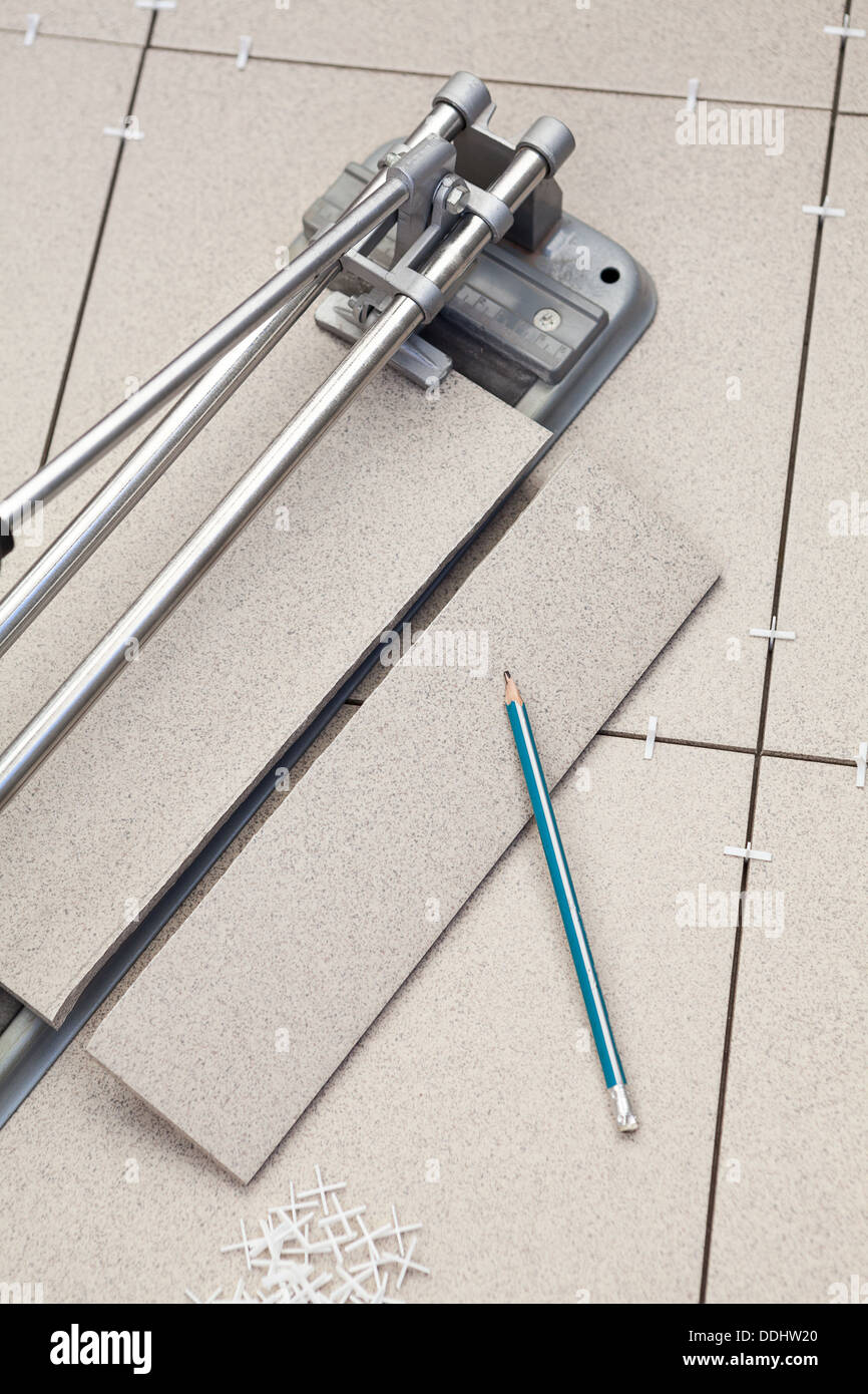 Tools for installation of the floor from a ceramic tiles Stock Photo ...