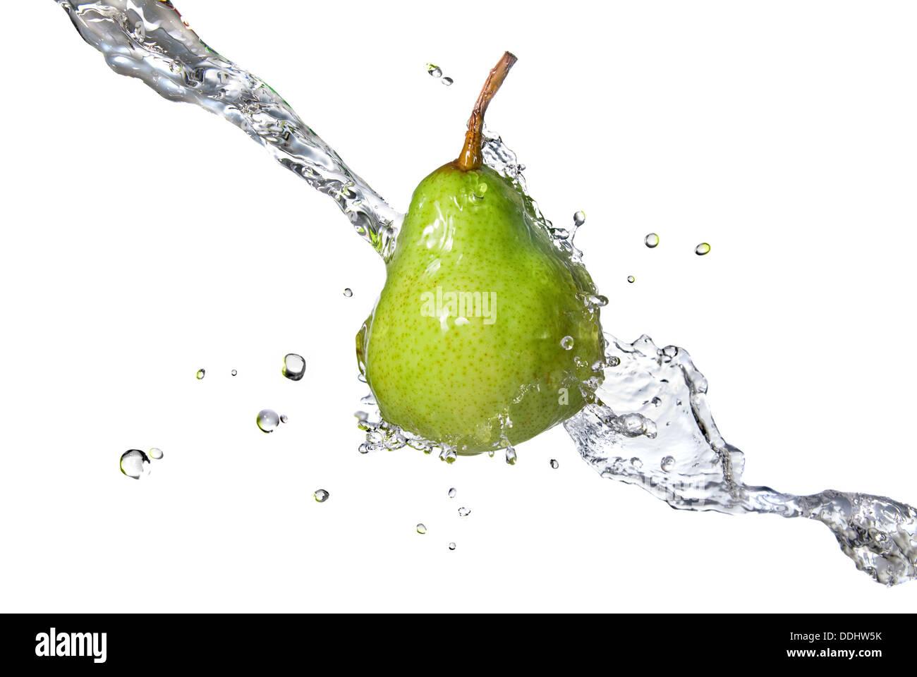green pear with water splash isolated on white Stock Photo - Alamy
