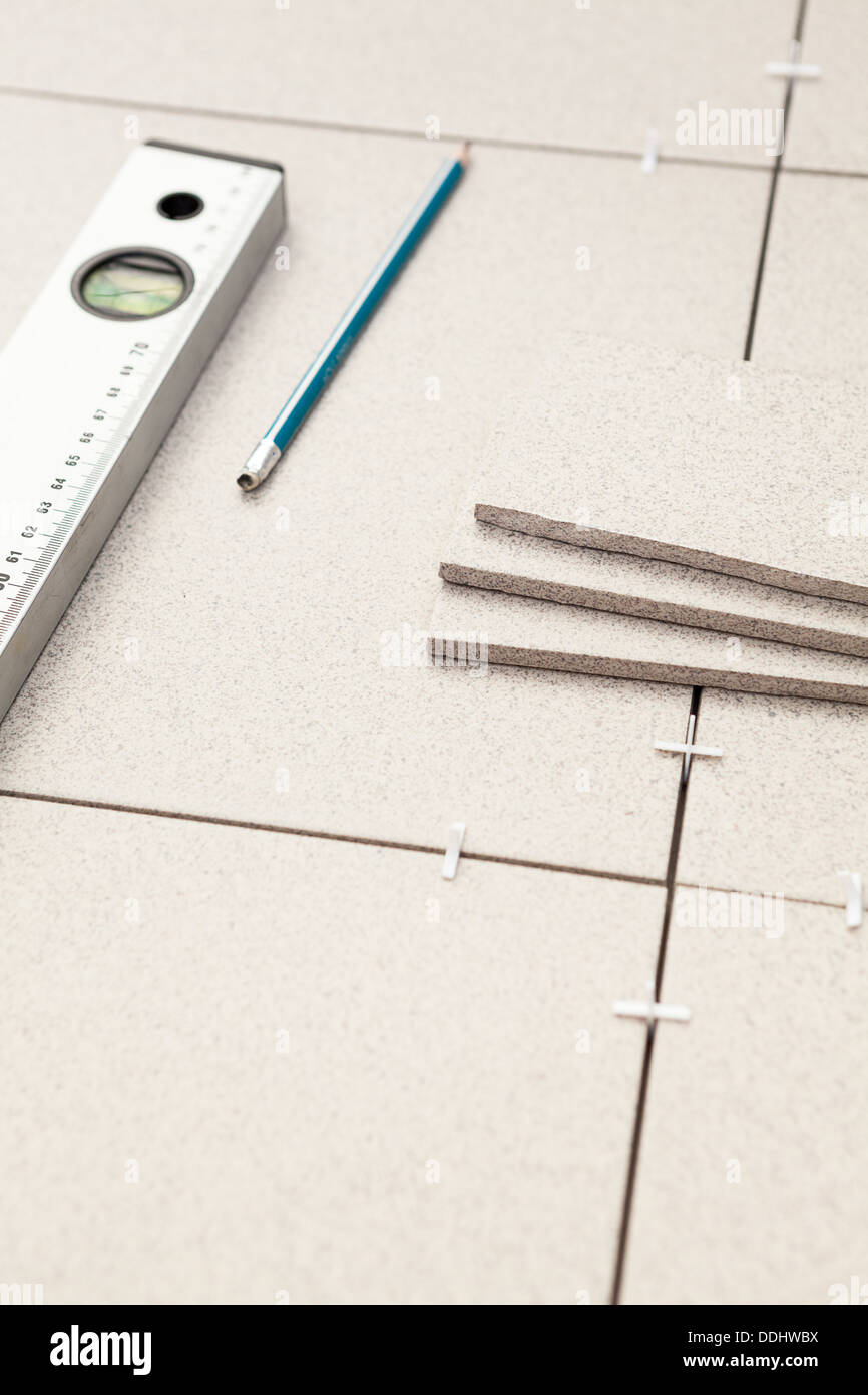 Floor marking for laying of tiles Stock Photo - Alamy