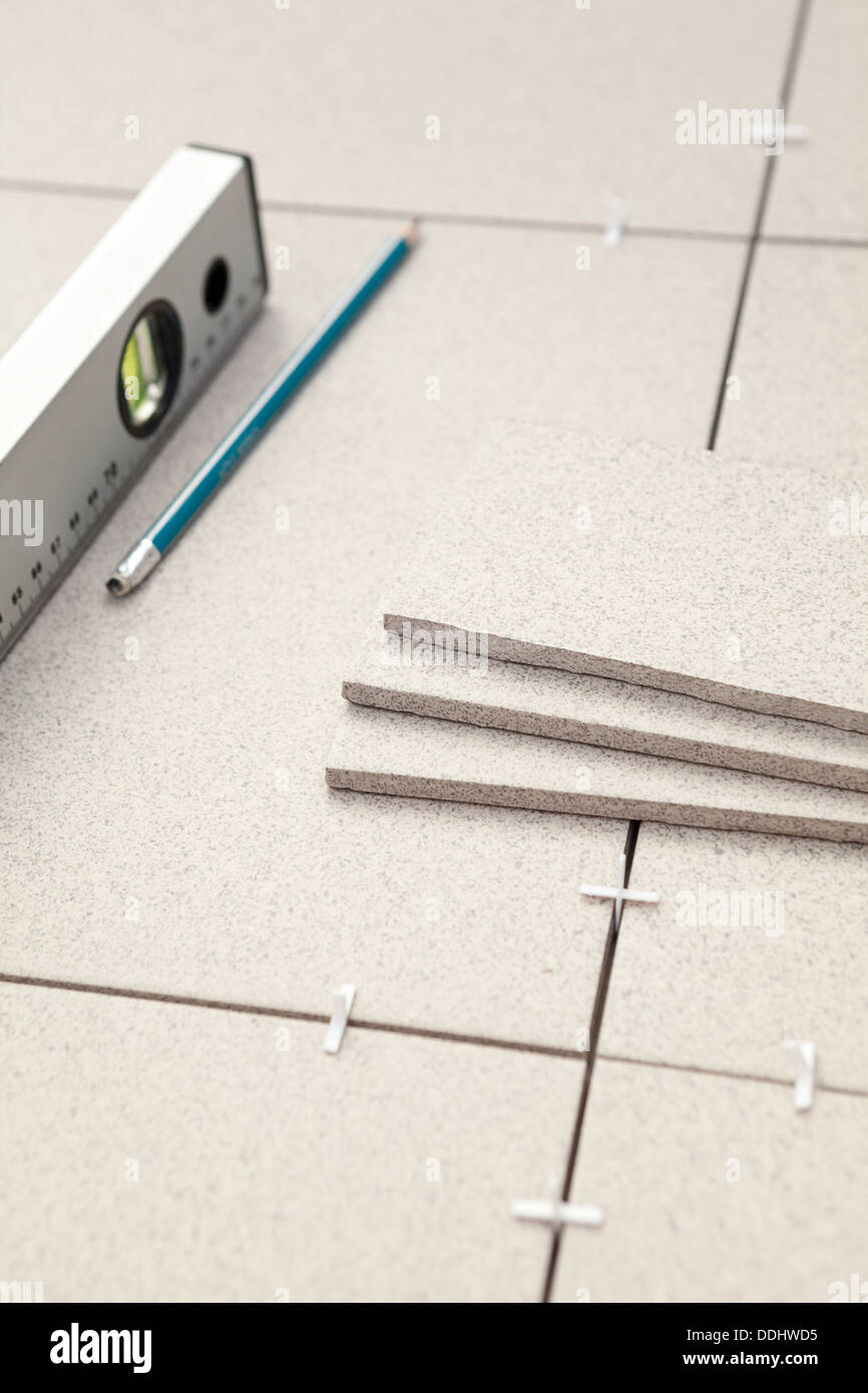 Preliminary floor marking for laying of tile Stock Photo - Alamy