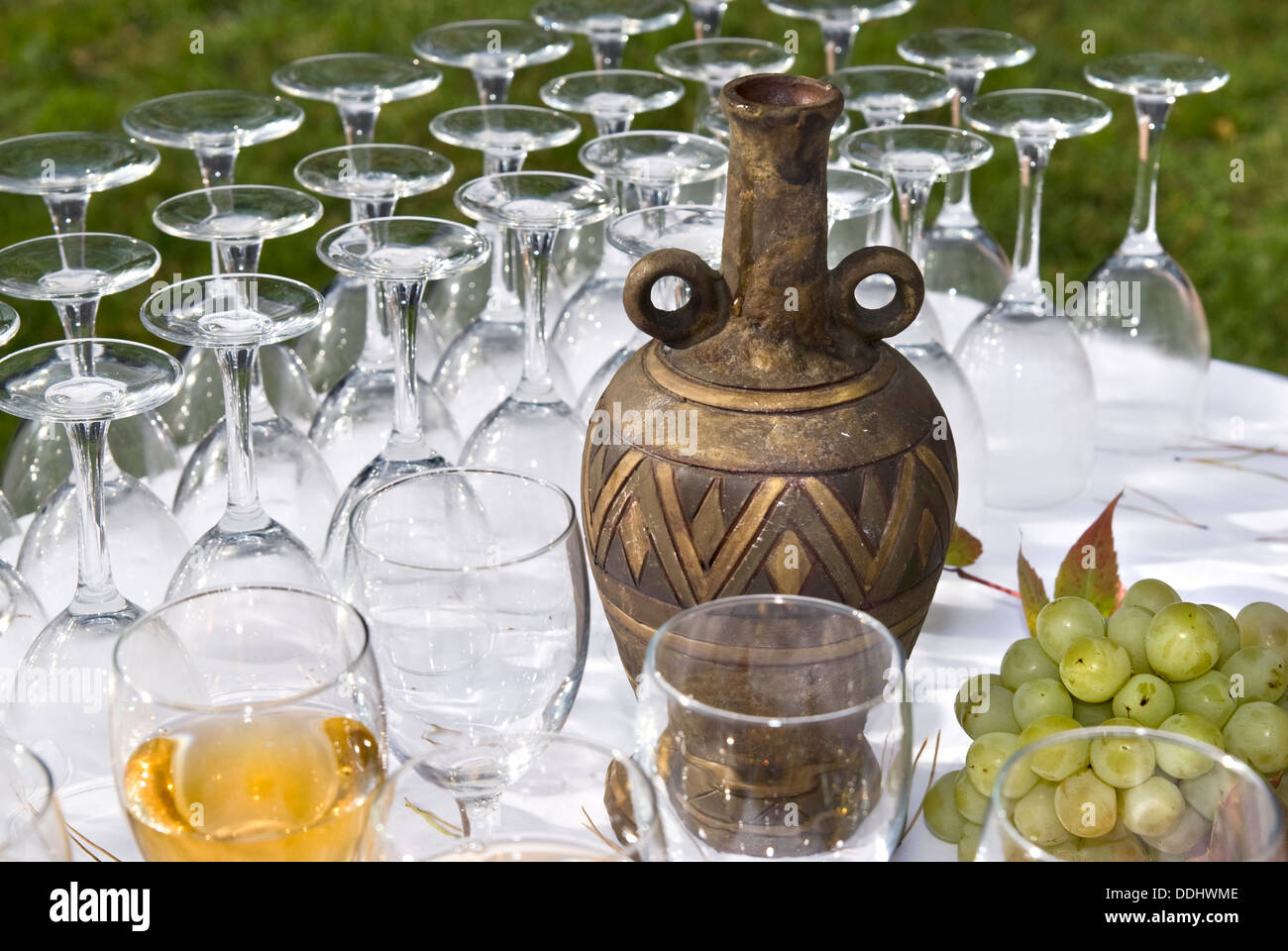 wine on table with grape Stock Photo - Alamy