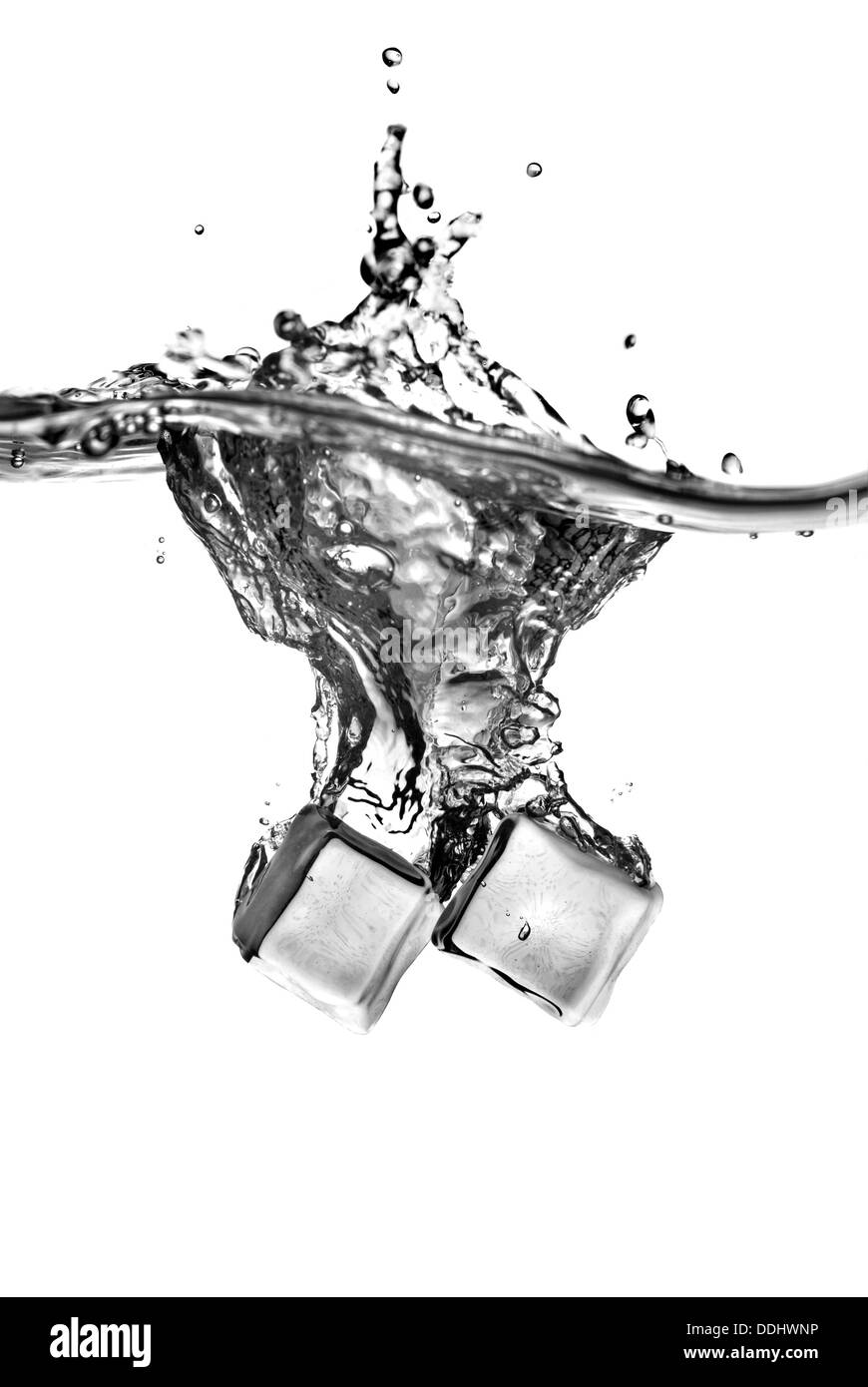 ice cubes dropped into water with splash isolated on white Stock Photo ...